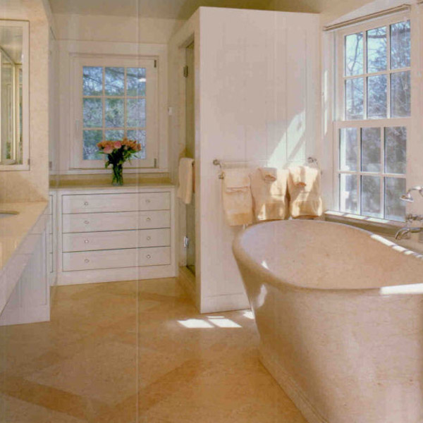 Eustis Bathroom cladding in a sunny light & gold limestone
